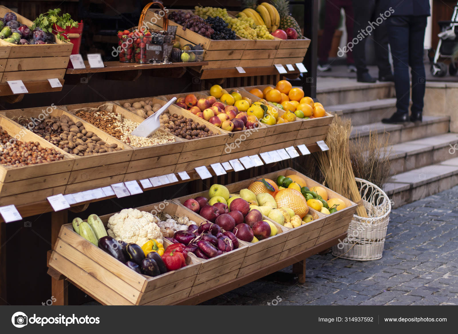 The fruit stand. Fresh healthy organic fruits, vegetables, nuts at a ...