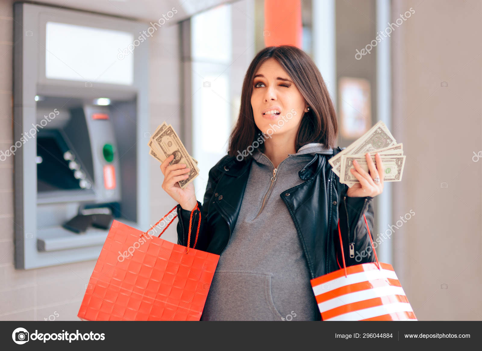 Big Spender Holding Money Front Atm Stock Photo by ©nicoletaionescu ...