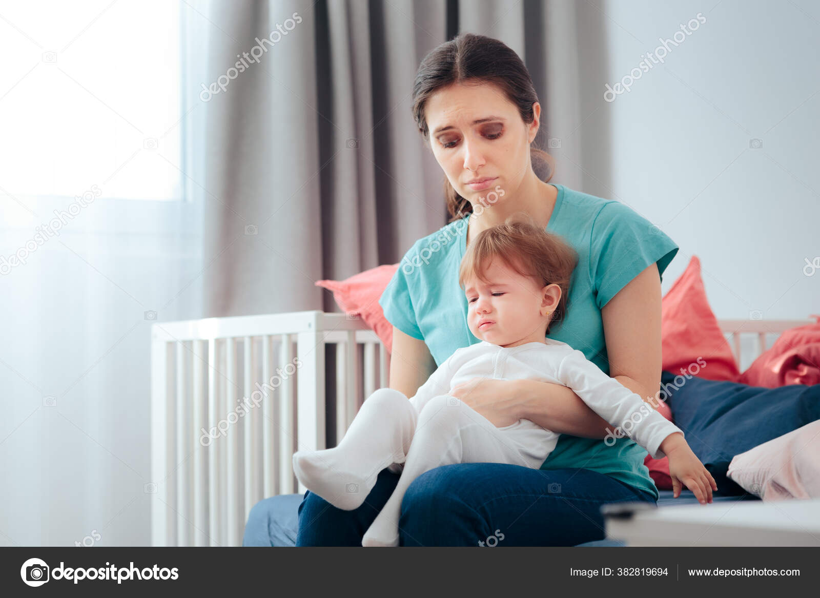 Sad Mother Trying Comfort Crying Baby Girl — Stock Photo © nicoletaionescu #382819694
