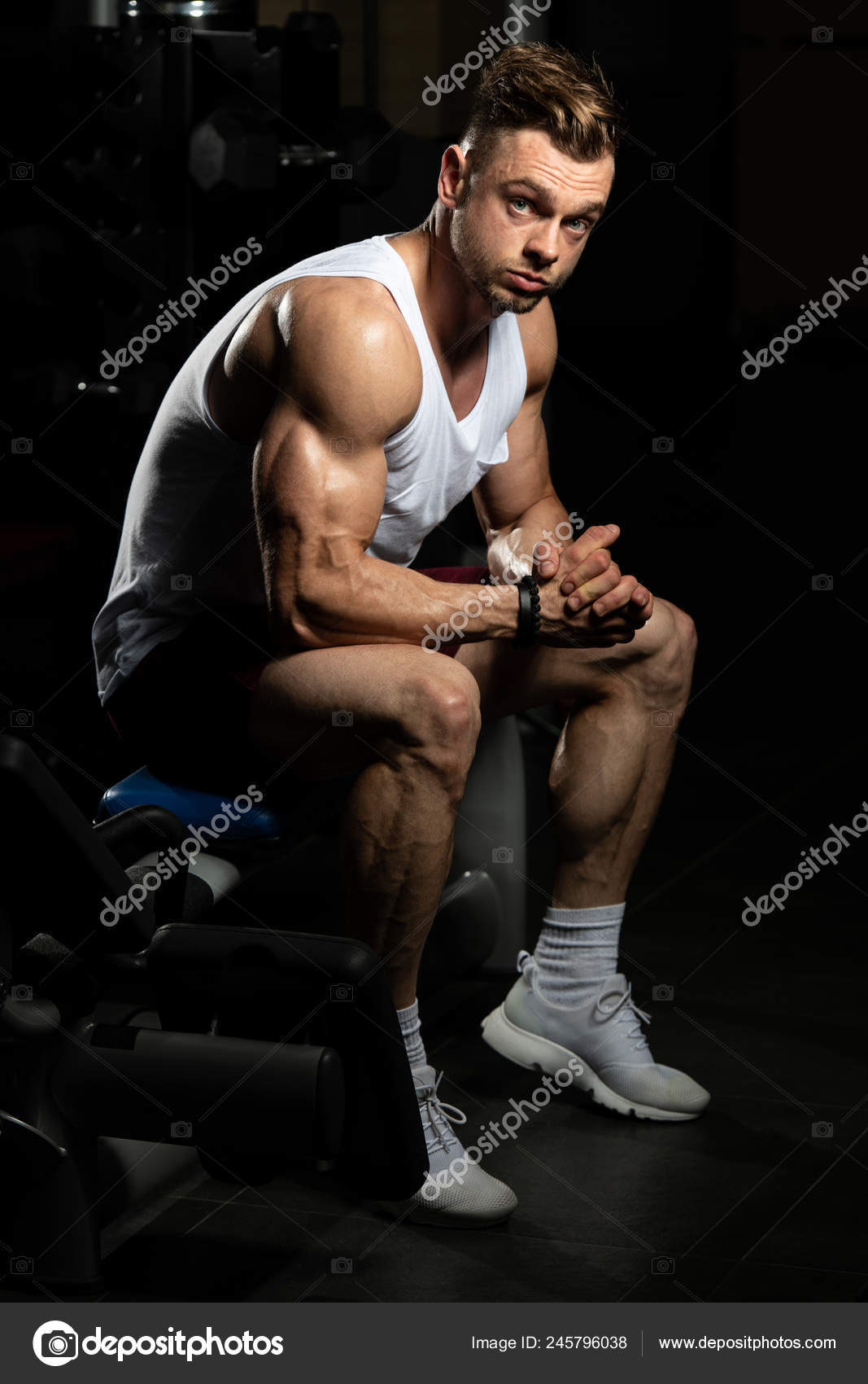 Attractive Man Resting Bench Exercise Fitness Center Stock Photo by ...