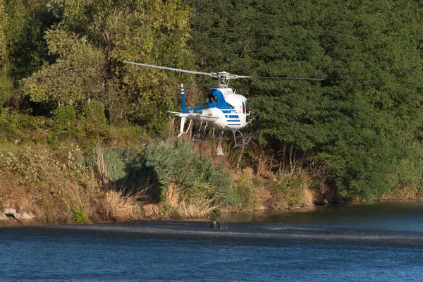 Helicopter on river Stock Photos, Royalty Free Helicopter on river ...