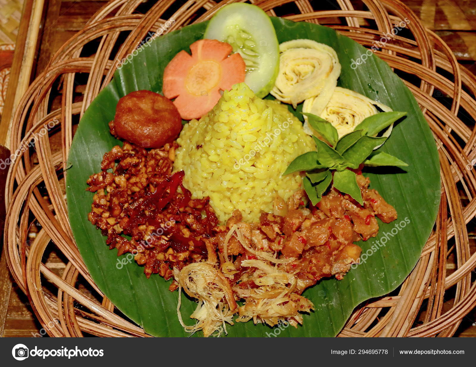 Nasi Kuning. Javanese turmeric rice with assorted side dishes — Stock ...