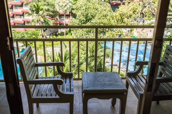 resting area of balcony with two couch armchair sofa outdoor. high view ...