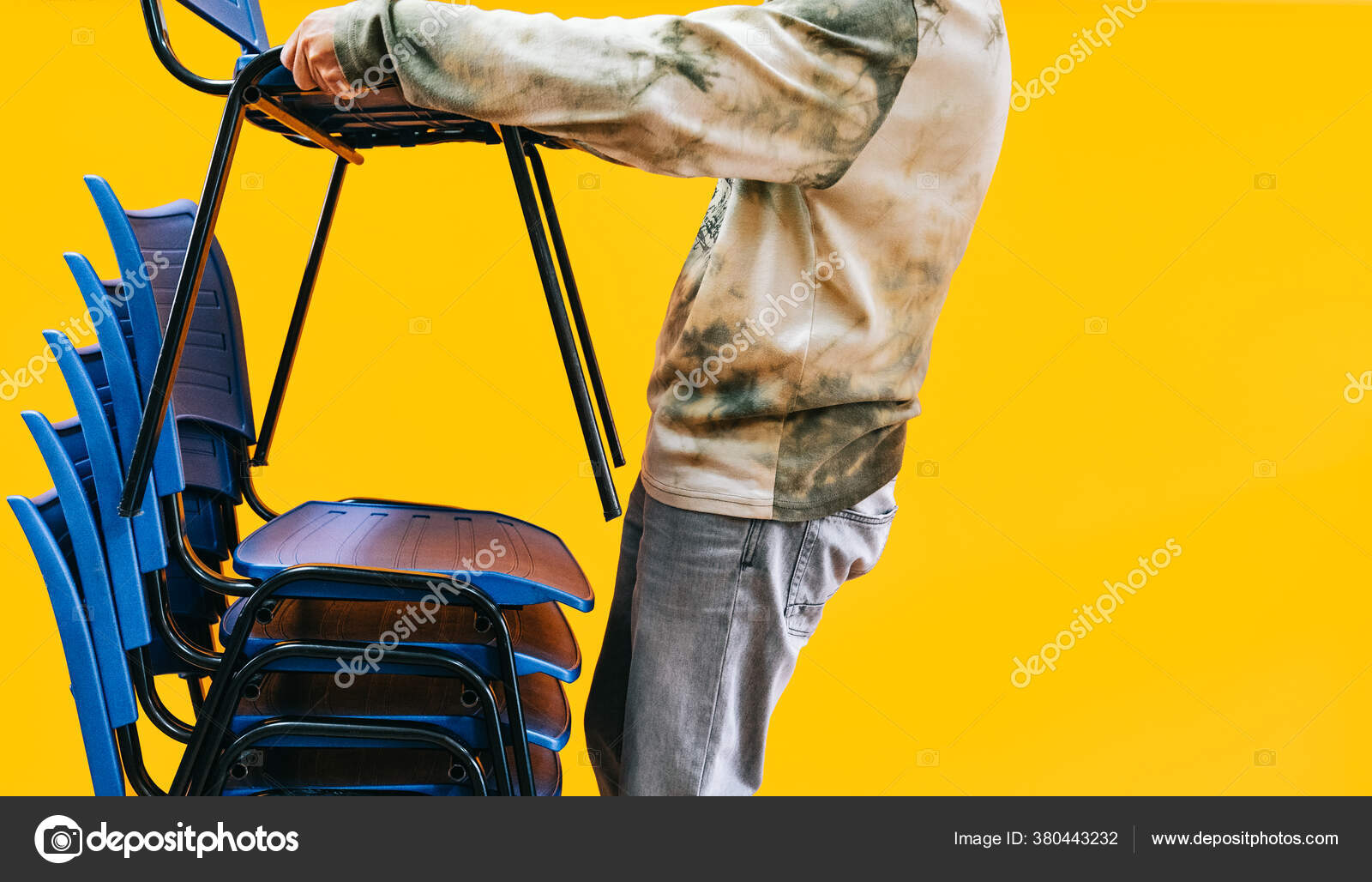 Man Picking Blue Chairs One Top Another Orange Background Adaptation ...
