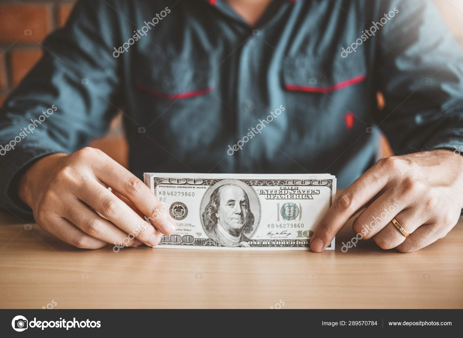 Man calculator Accounting Calculating with US Dollar money growi Stock ...