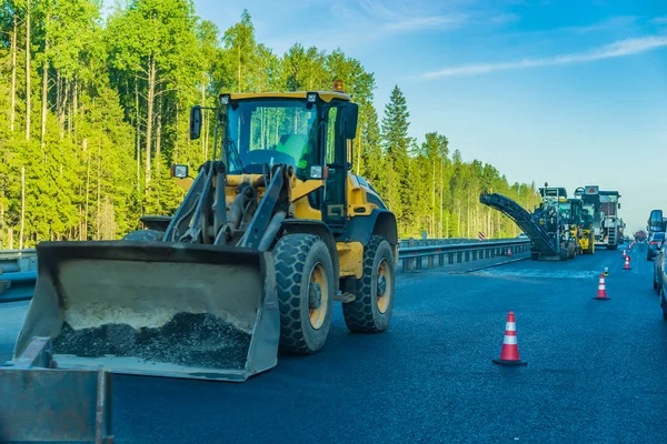 Repair of asphalt pavement. Preparation for asphalt paving. Special ...