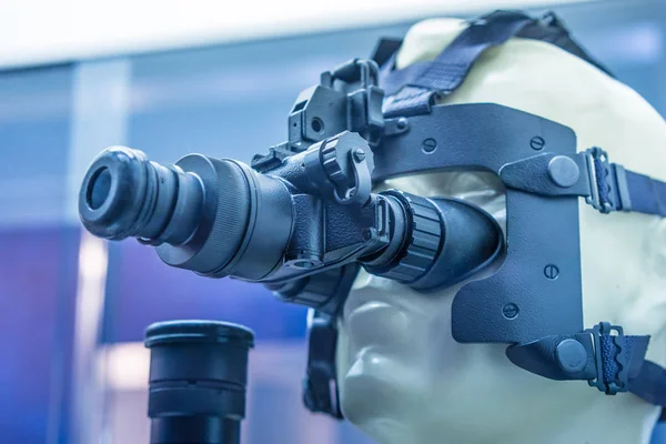 Night-vision device. Helmet with night vision. A standard telescopic ...