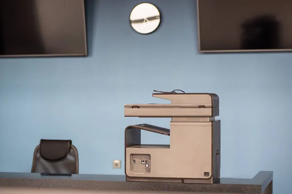 Multifunctional office device. Inkjet printer on the office desk ...