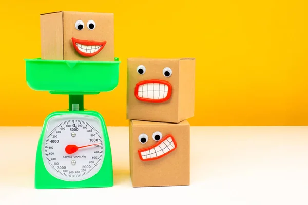 Emoji. Parcels. The joy of weighing. Sending by mail. Parcel is weighed ...