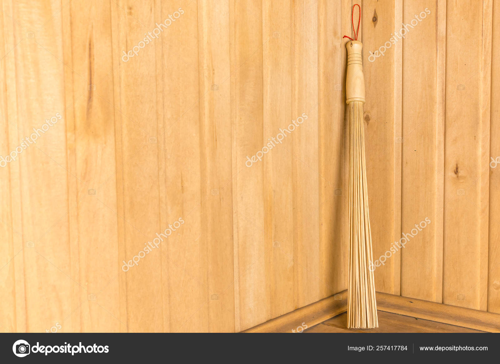 Bamboo broom stands on a shelf in the corner of the sauna Stock Photo ...