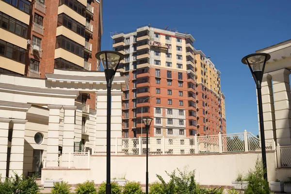 high-rise buildings in orange and beige - Stock Image - Everypixel
