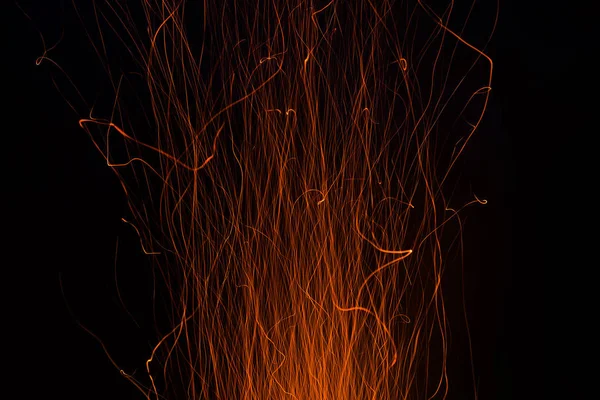 Abstract drawing of sparks from a fire in the dark sky - Stock Image ...