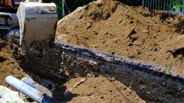 Excavator Puts Soil Trench Laying Pipes Ground Backfilling Sand Pits ...