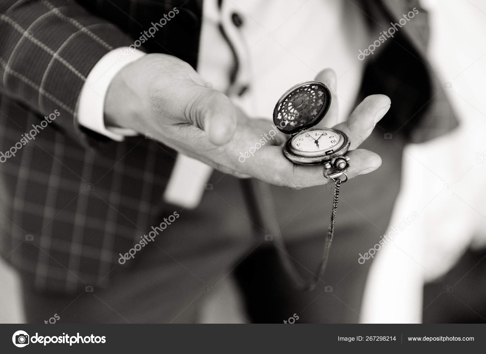 Pocket watch in a man's hand — Stock Photo © AndeyJulay #267298214