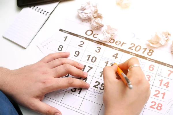 Hand Holding Calendar And Pen — Stock Photo © AndreyPopov #39131275