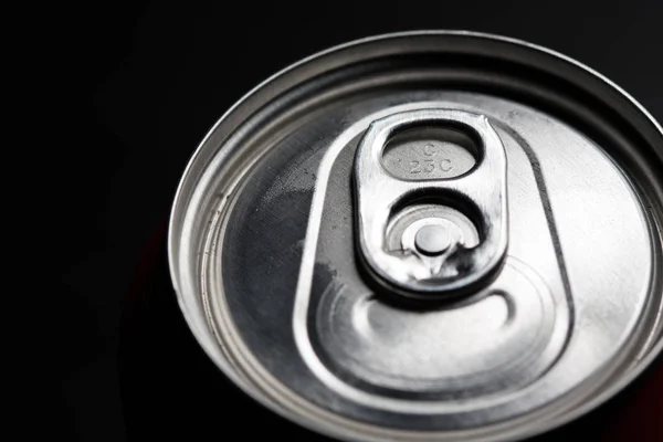 Hand holding a can of cold soda. Cold soft drinks with excess sugar ...