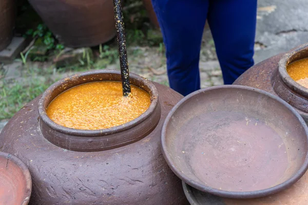 Jars of processing salted soybean paste jam made by traditional outdoor ...