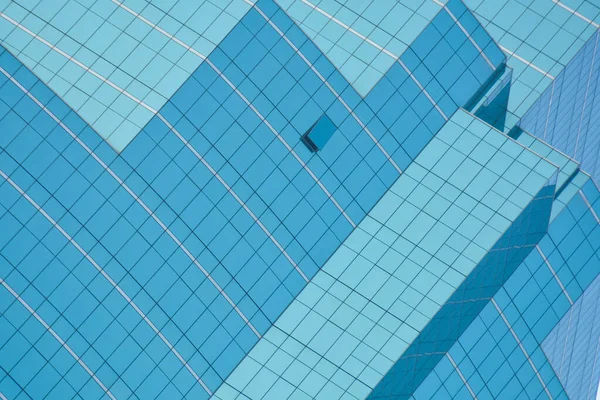 pattern of modern glass windows building skyscrapers of business center ...