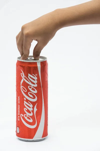 Hand holding the coca cola Stock Photos, Royalty Free Hand holding the ...