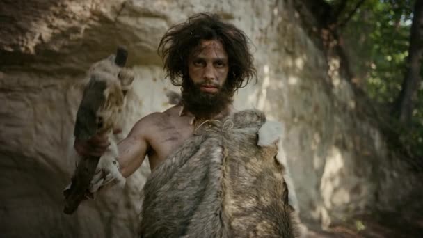 Primeval Caveman Wearing Animal Skin Holds Stone Hammer Looks Around ...