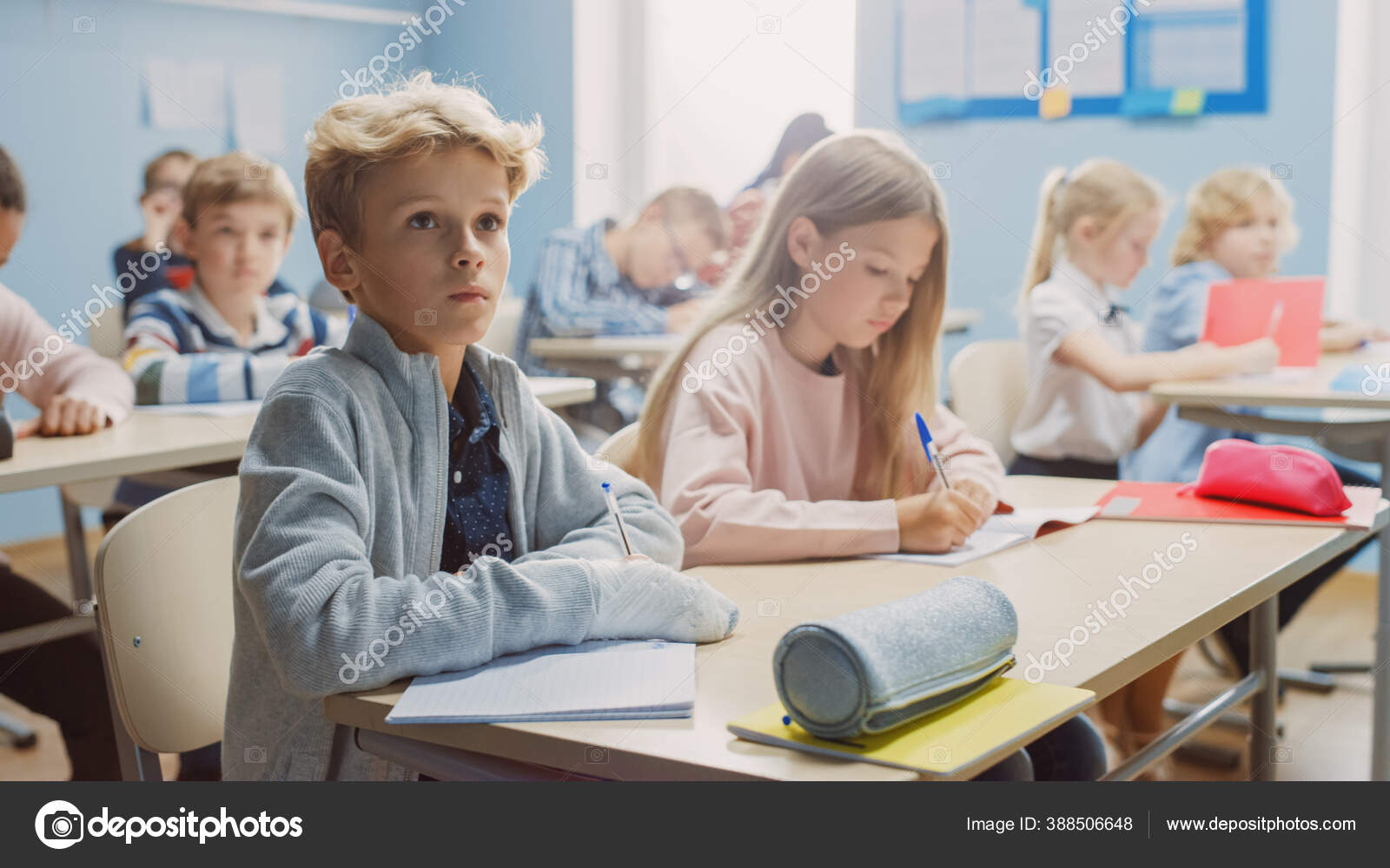 Children Listening To The Teacher