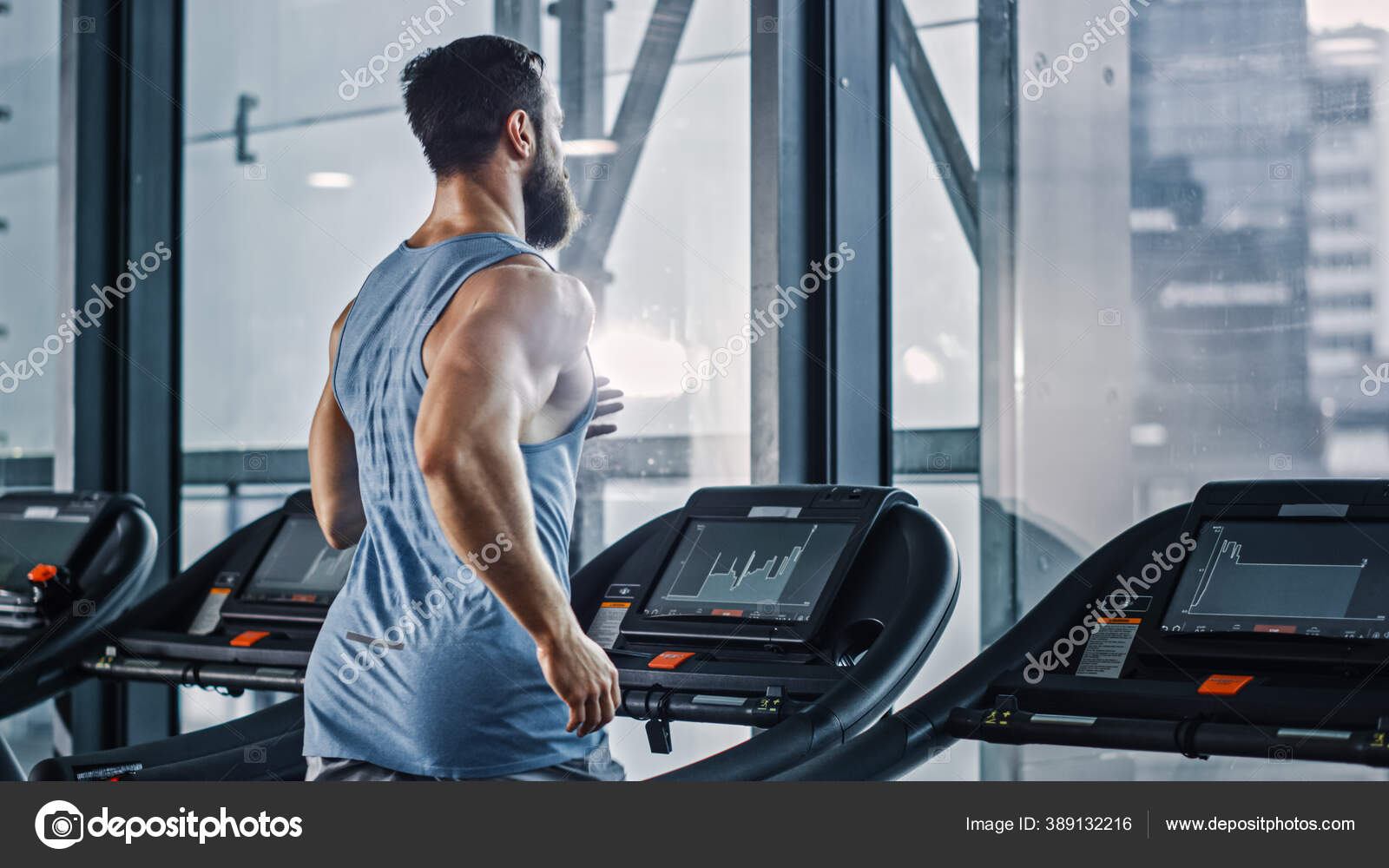 Athletic Muscular Man Running on a Treadmill, Leg and Cardio Day ...