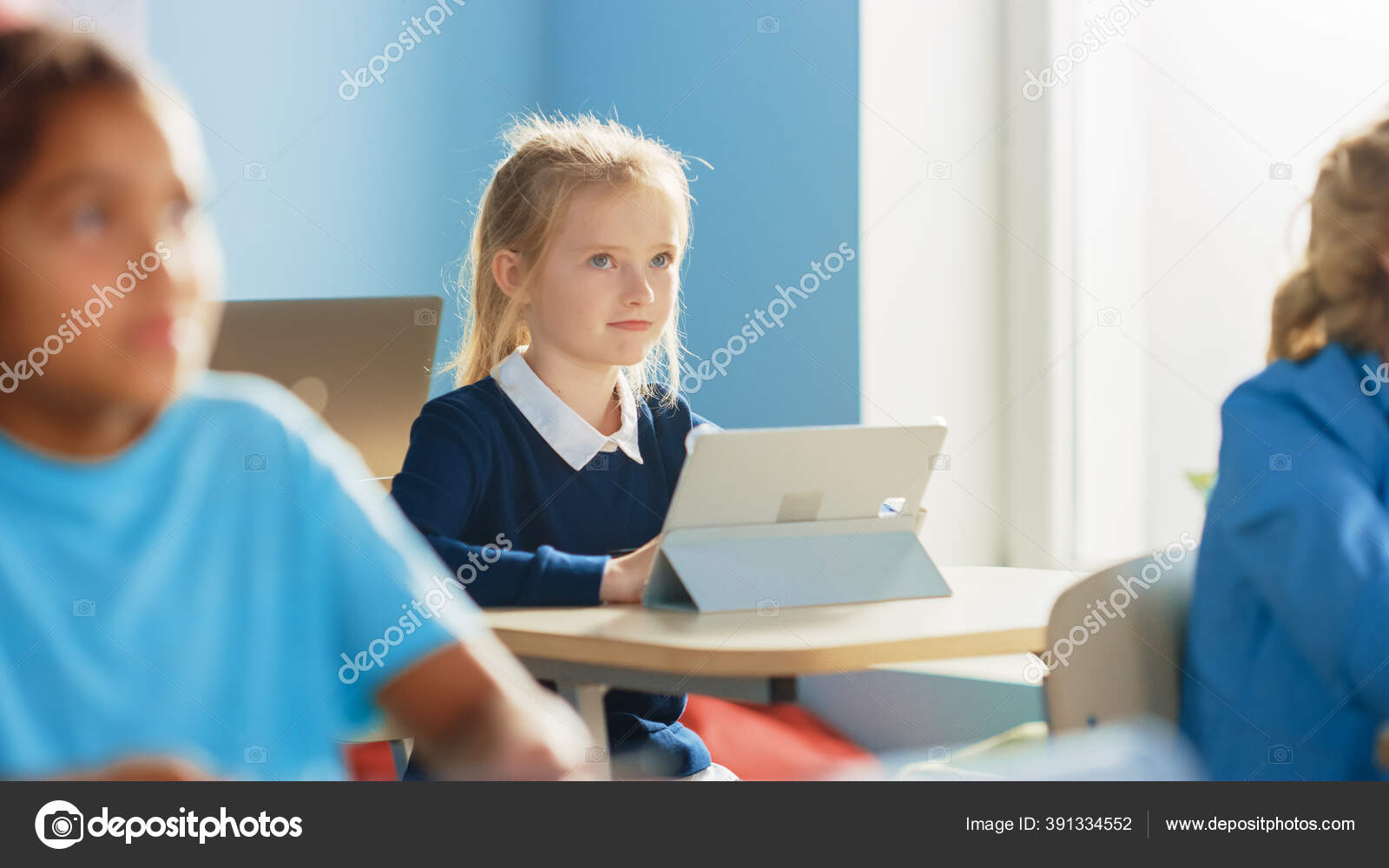 Elementary School Computer Science Class: Cute Girl Uses Digital Tablet ...