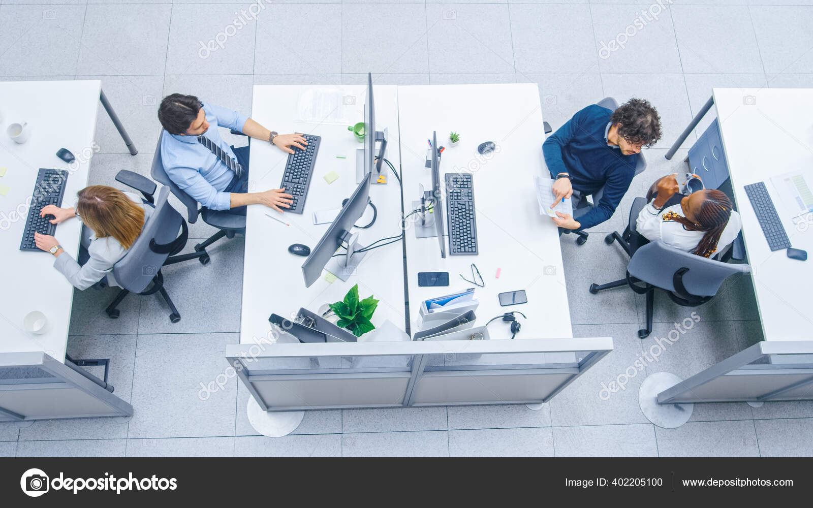 In Bright Busy Office Rows of Diverse Professionals Working on ...