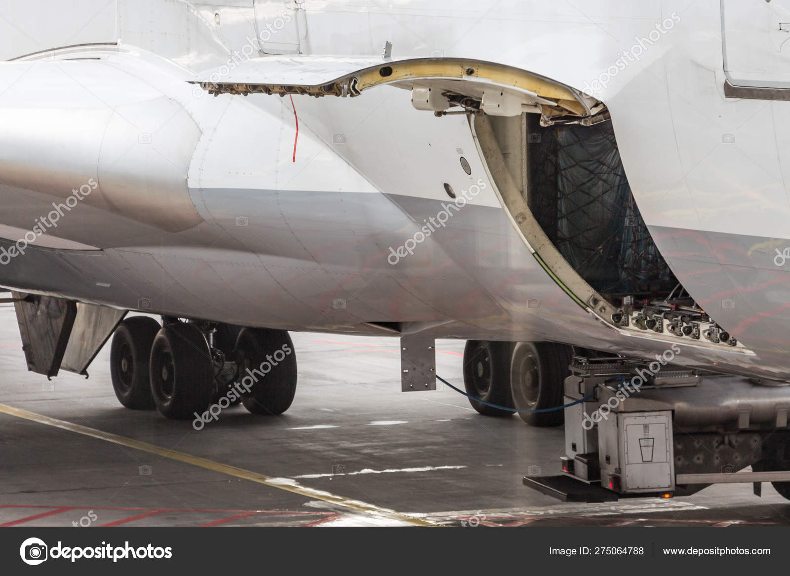 Open cargo door of a jumbo jet aircraft. Stock Photo by ©ruramos 275064788