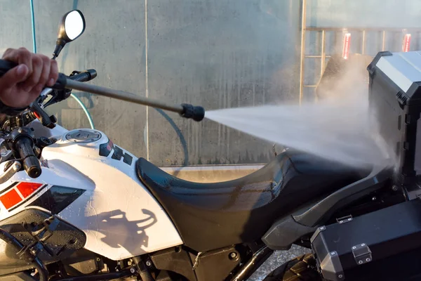 Cleaning a motorcycle Stock Photos, Royalty Free Cleaning a motorcycle ...