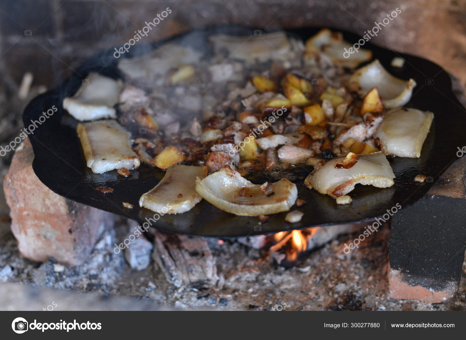 Salo is fried in a pan in a stove on a fire — Stock Photo © kapinosova ...