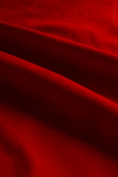 Dark red matte background of suede fabric, closeup. Velvet texture of ...