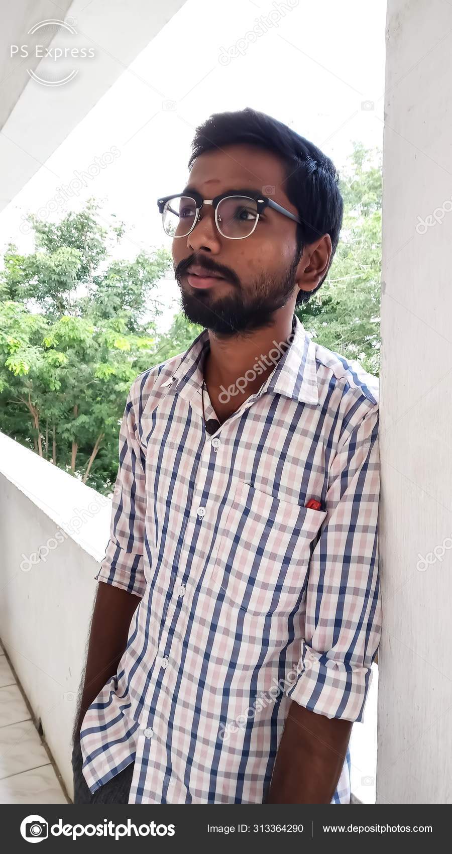 Young man standing normally with a lot of thinking — Stock Photo ...