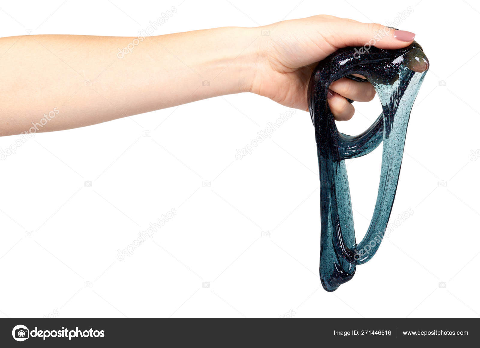 Hand with black slime toy for kids, glitters and goo. Stock Photo by ...