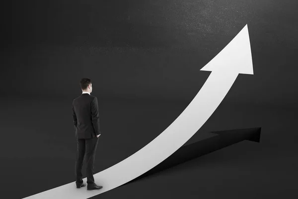 Personal growth concept with businessman looking at white upward road ...