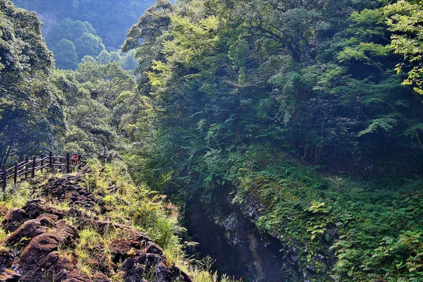 Takachiho Gorge, a narrow chasm cut through the rock by Gokase River ...