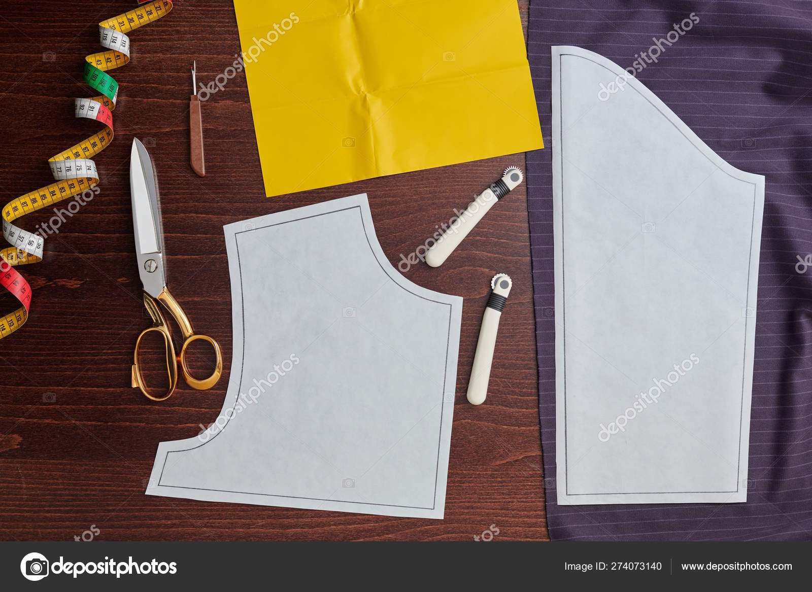 Sewing pattern on fabric, tracing wheel, tracing paper, sewing ...