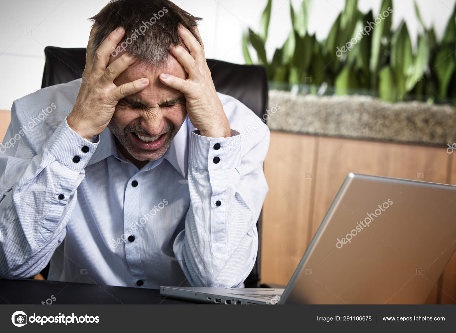 Man Crying At Computer