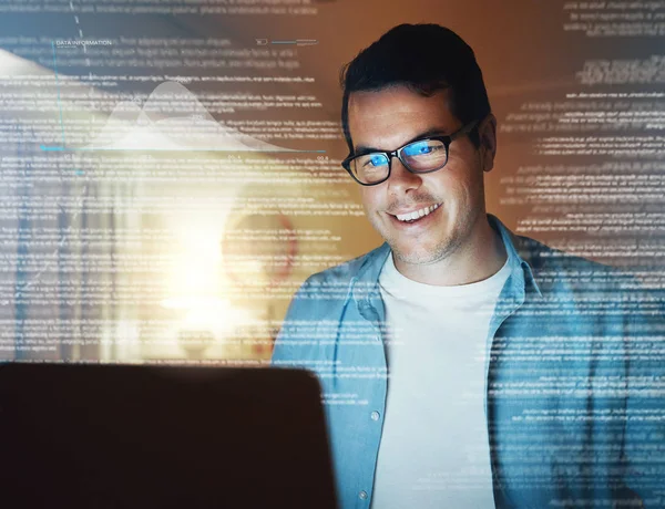 Smiling male freelancer working on web with laptop - Stock Image ...