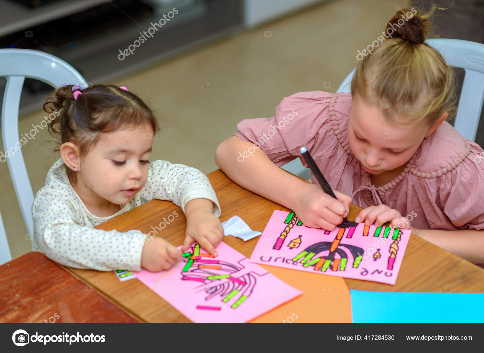 Kids Draw and Play With Stickers. Playing with stickers can help child ...