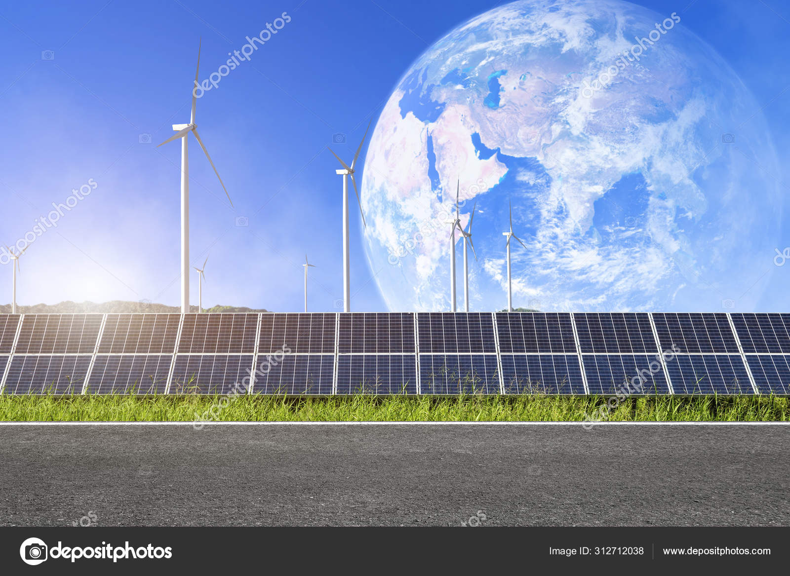 Asphalt road with solar panels with wind turbines against mounta Stock ...
