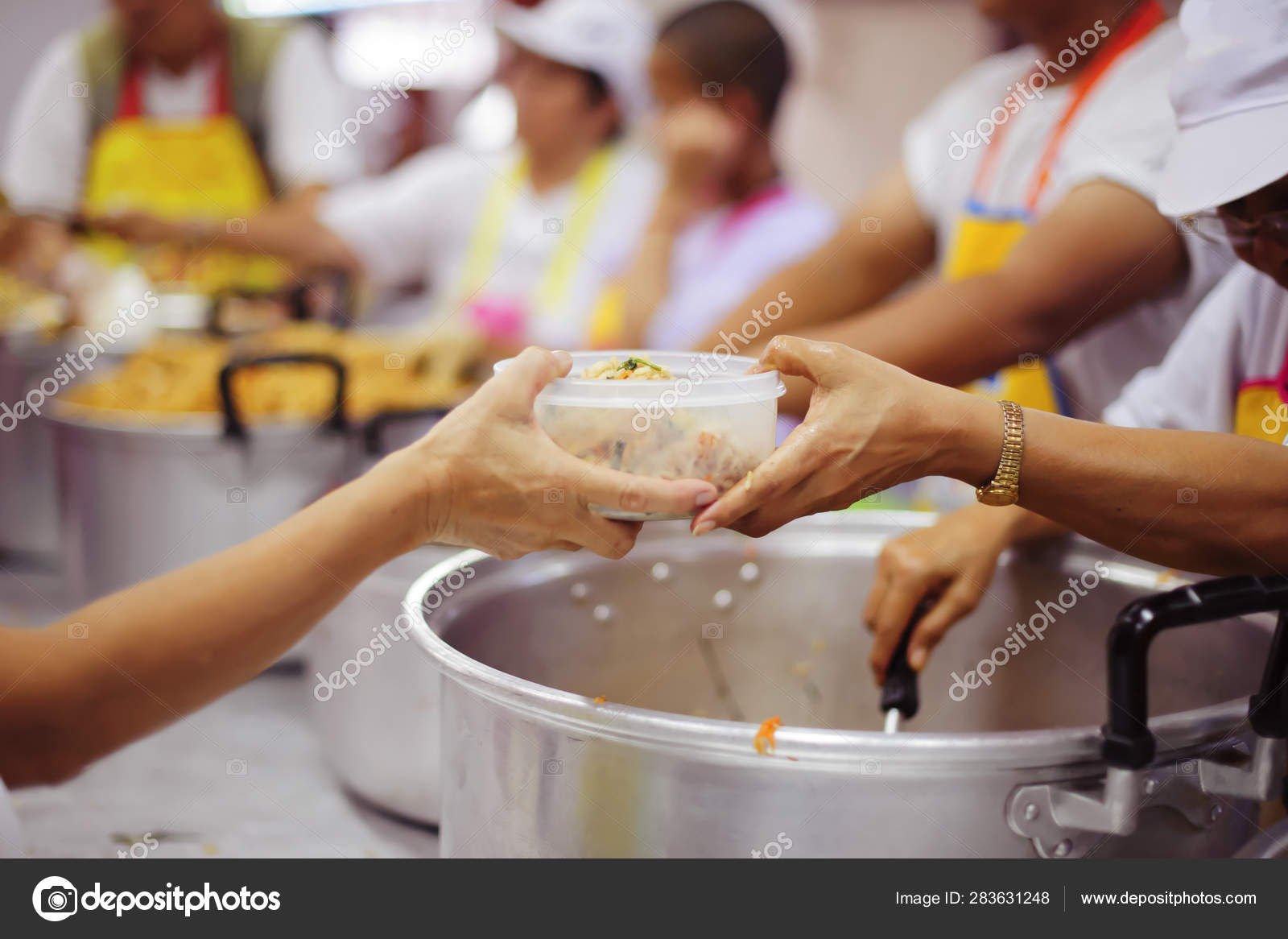 People Helping The Homeless With Food