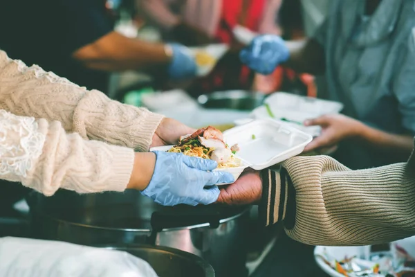 The concept of begging food : Hands of the poor are waiting for food ...