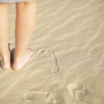 Walk barefoot on hot sand Stock Photo by ©Yarygin 9784498