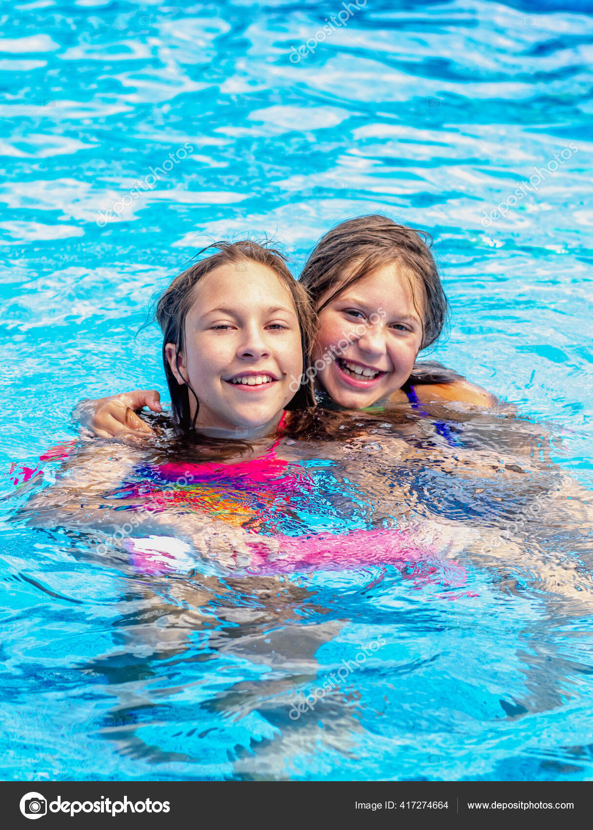 Sisters Friends Young Tweens Splash Together Clear Blue Swimming Pool ...