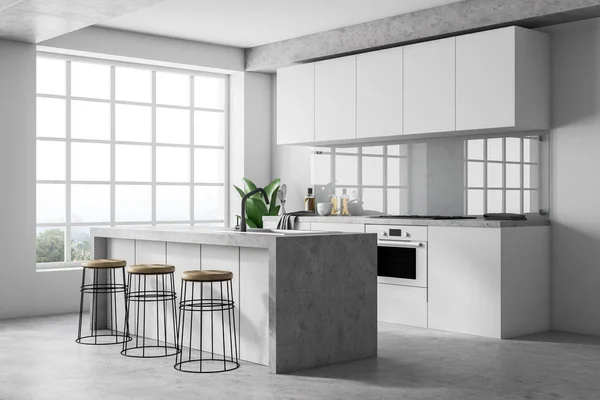 Side view of modern kitchen with white walls, concrete floor, white ...