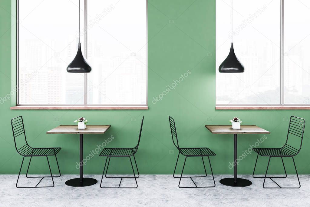Interior de cafetería minimalista con paredes verdes, suelo de nido de ...