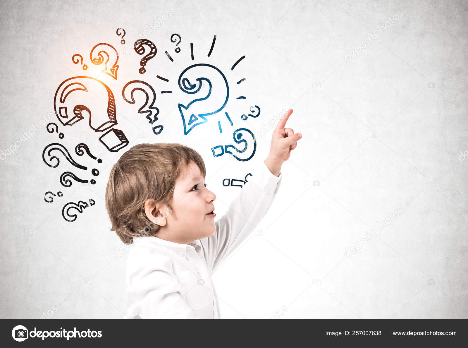 Little boy and question marks Stock Photo by ©denisismagilov 257007638