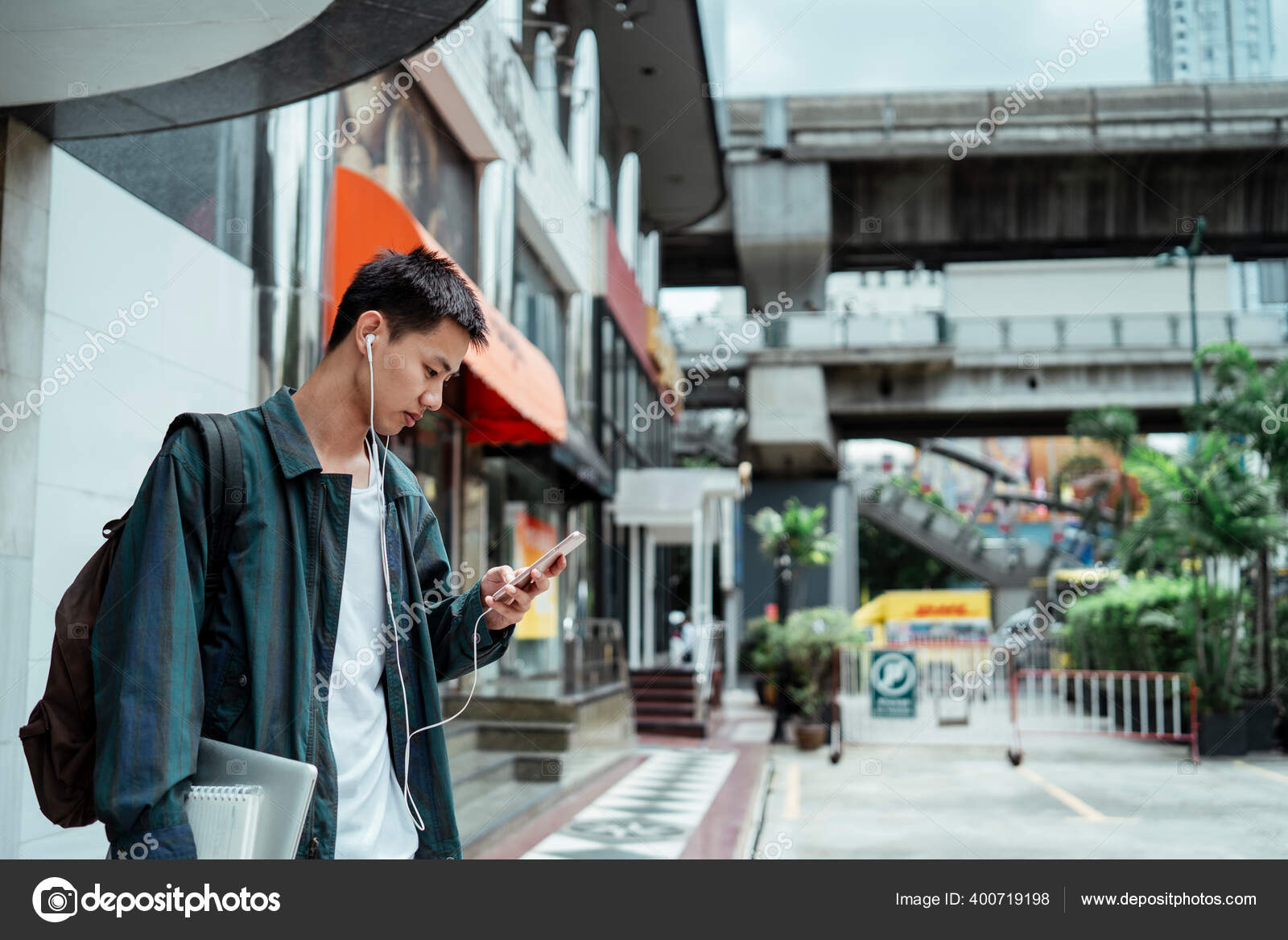 Short Hair Man Standing Front Building Listening Music While Waiting ...