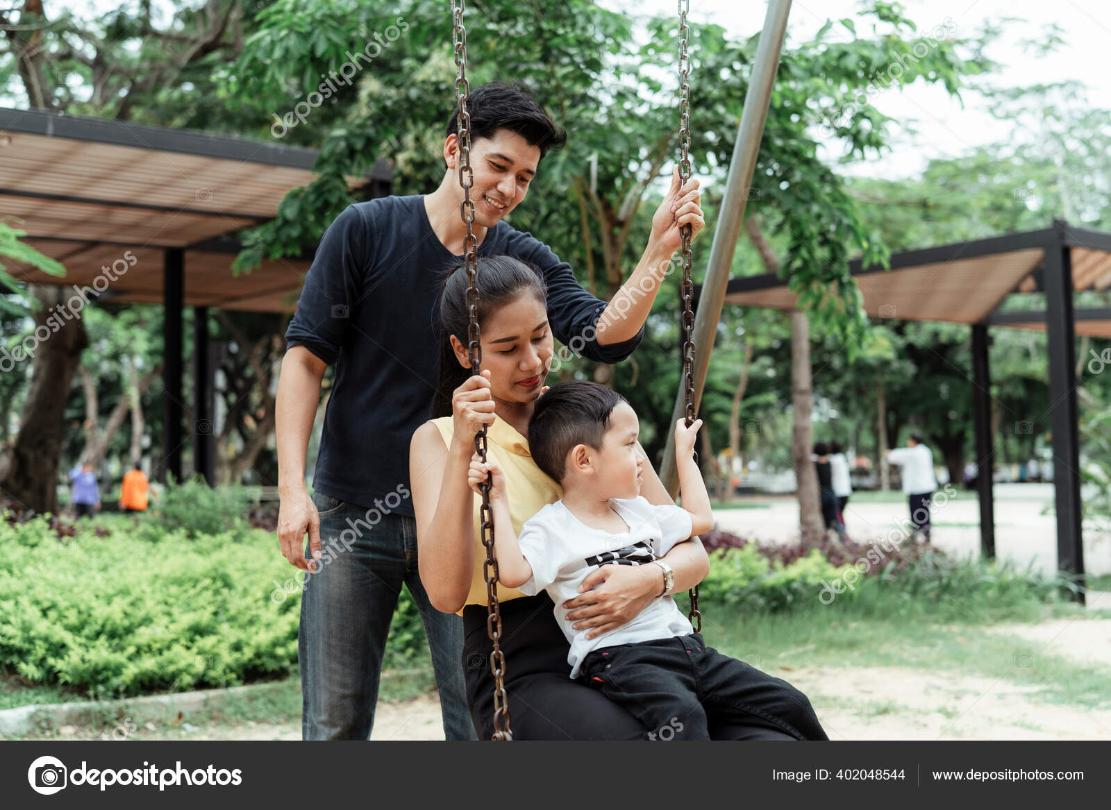 Little Boy Sitting His Mom's Lap While She Sitting Swing Stock Photo by ...